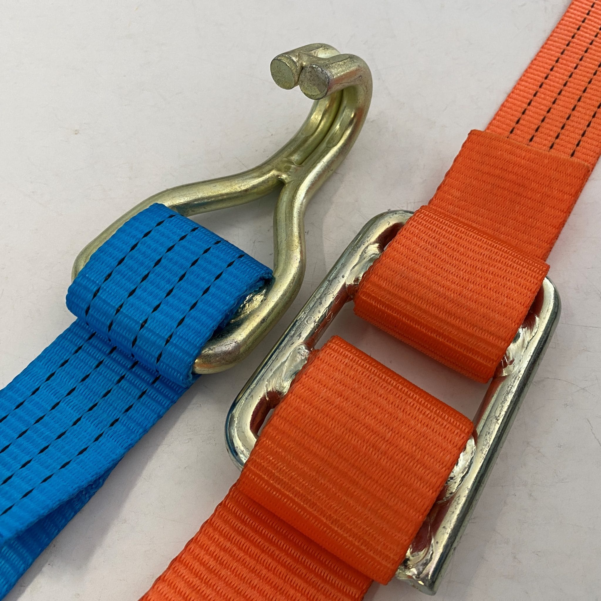 Cargo securing components used in the manufacture of cargo straps.