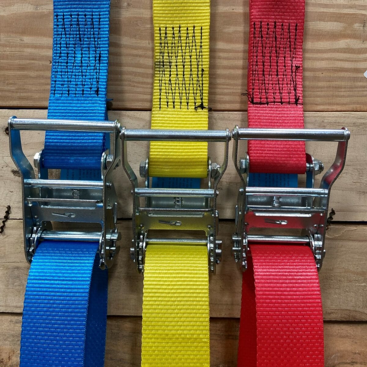 Cargo securing components used in the manufacture of cargo straps.